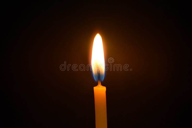 One Candle Burning Brightly in the Dark. Stock Photo - Image of ...