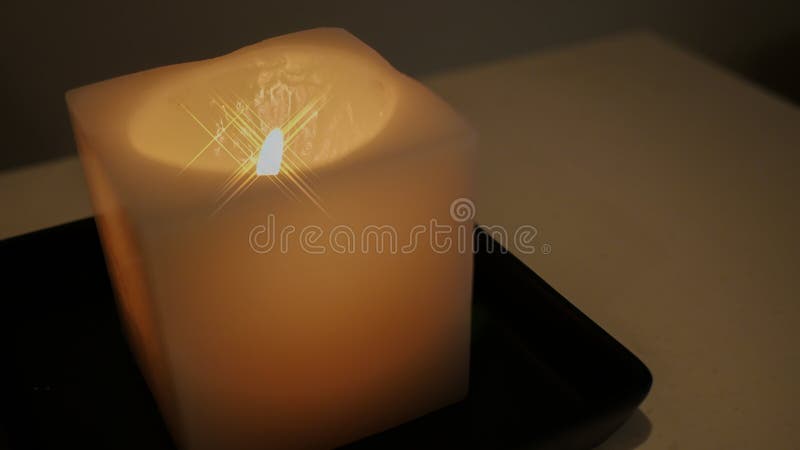 One Candle Glowing in Dim Light Stock Photo - Image of concept, black ...