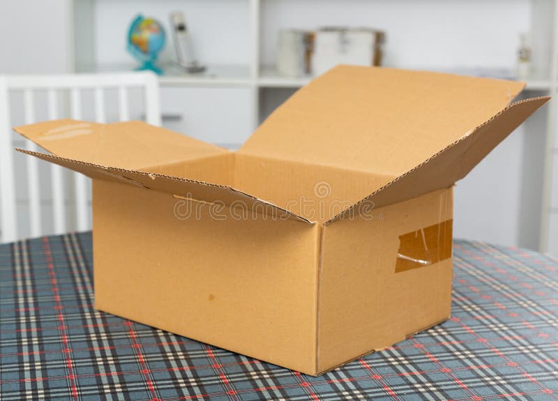 One Cardboard Box on Top of Table Stock Photo - Image of indoor, table ...