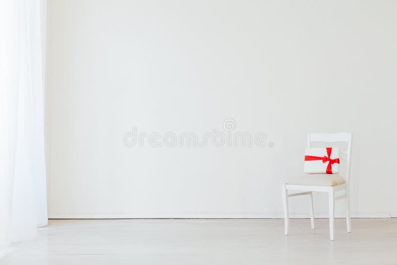 One Chair with a Gift in the Interior of a White Empty Room Stock Image ...