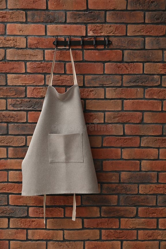One Chef S Apron Hanging on Brick Wall Stock Image - Image of care ...