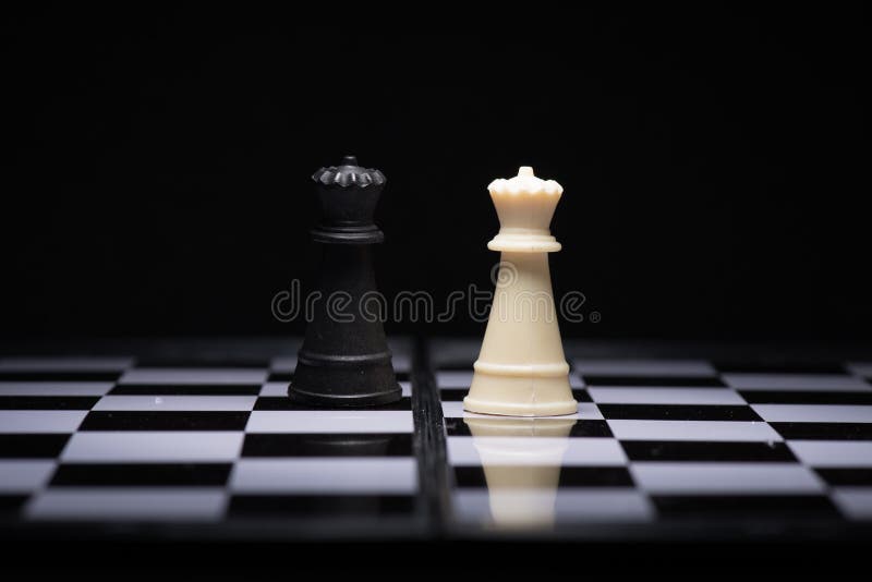 One Chess Pieces Staying Against Black Chess Pieces Stock Image - Image ...