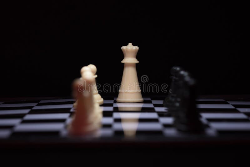 One Chess Pieces Staying Against Black Chess Pieces Stock Image - Image ...