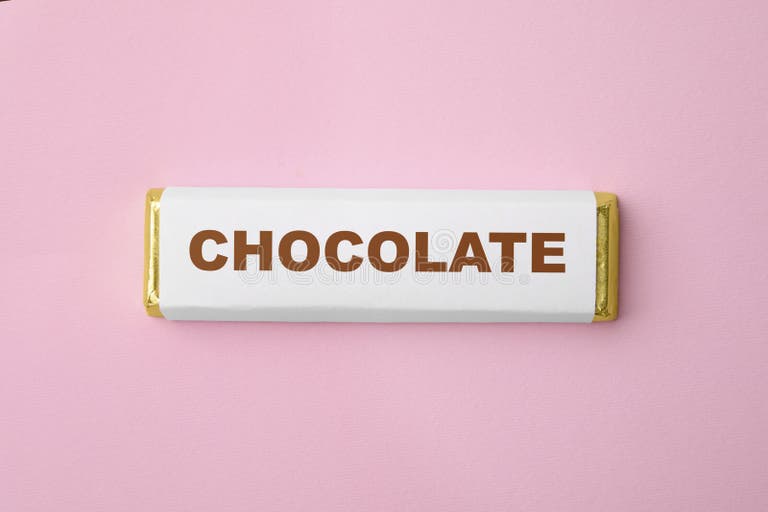One Chocolate Bar in Packaging on Pink Background, Top View Stock Photo ...