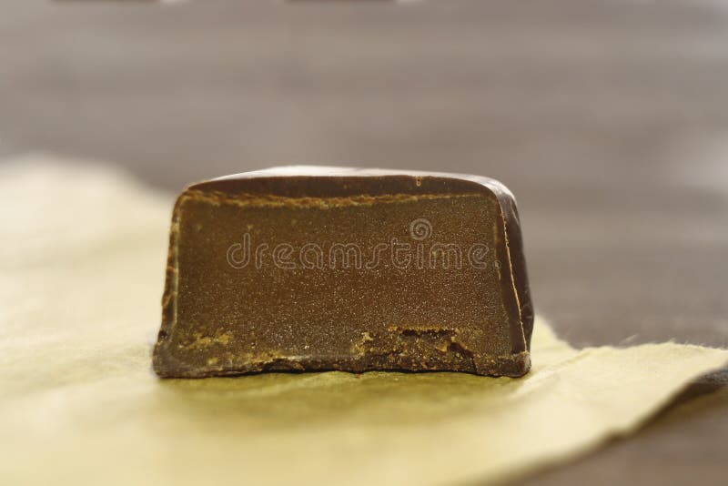 One Chocolate Candy Cut in Half Stock Photo - Image of gourmet, cacao ...