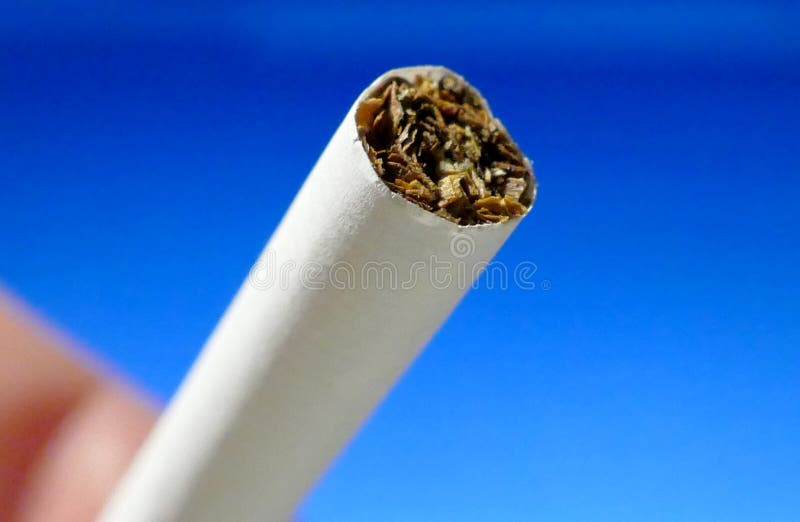 One Cigarette in Hand Macro Shot on Stock Photo - Image of danger, burning: 114841336