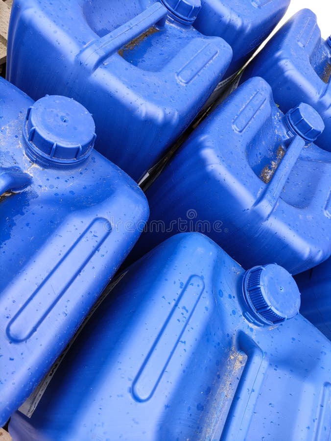 One Color Engine Oil Gallons on the Stand Stock Image - Image of full ...