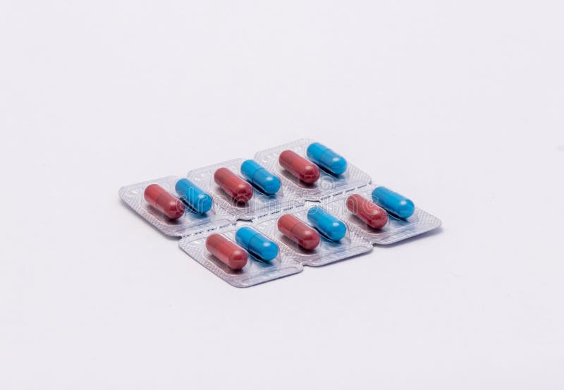 One Complete Sealed Package with Yellow Oval Shaped Pills Lies on a ...