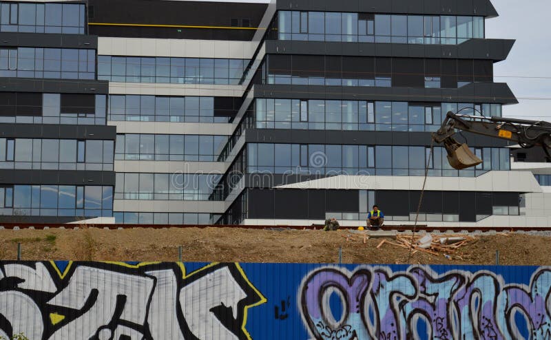 Construction Site and Workers on a Break Editorial Photography - Image ...