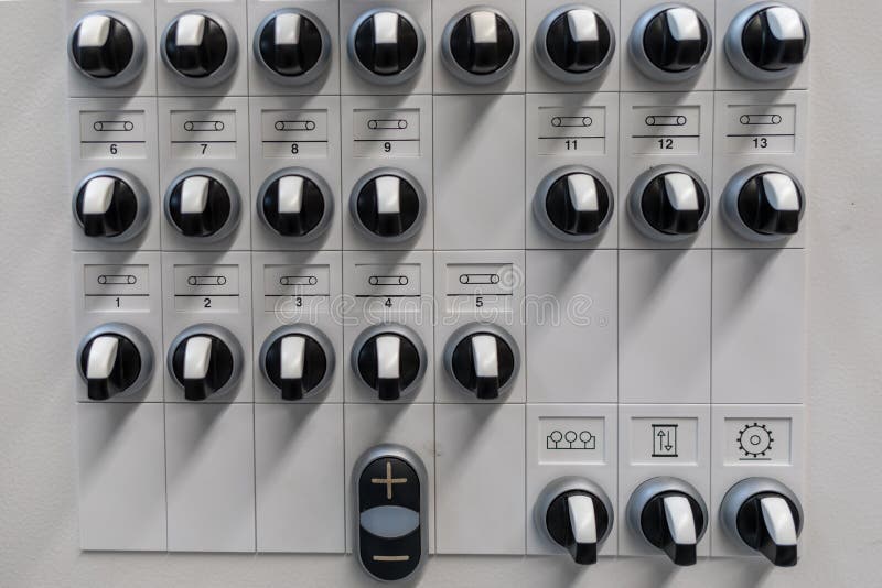 One Control Panel There are Many Black Switches Next To Each Other and ...