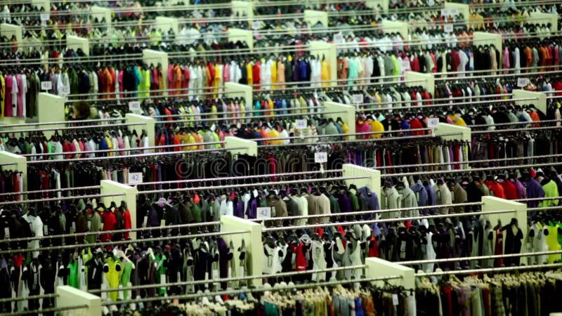 One Customer Walk among Clothes in Large Shop Stock Video - Video of ...