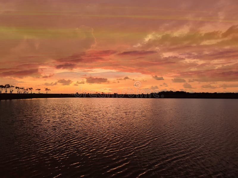 One day sunset around me stock photo. Image of water - 263639840