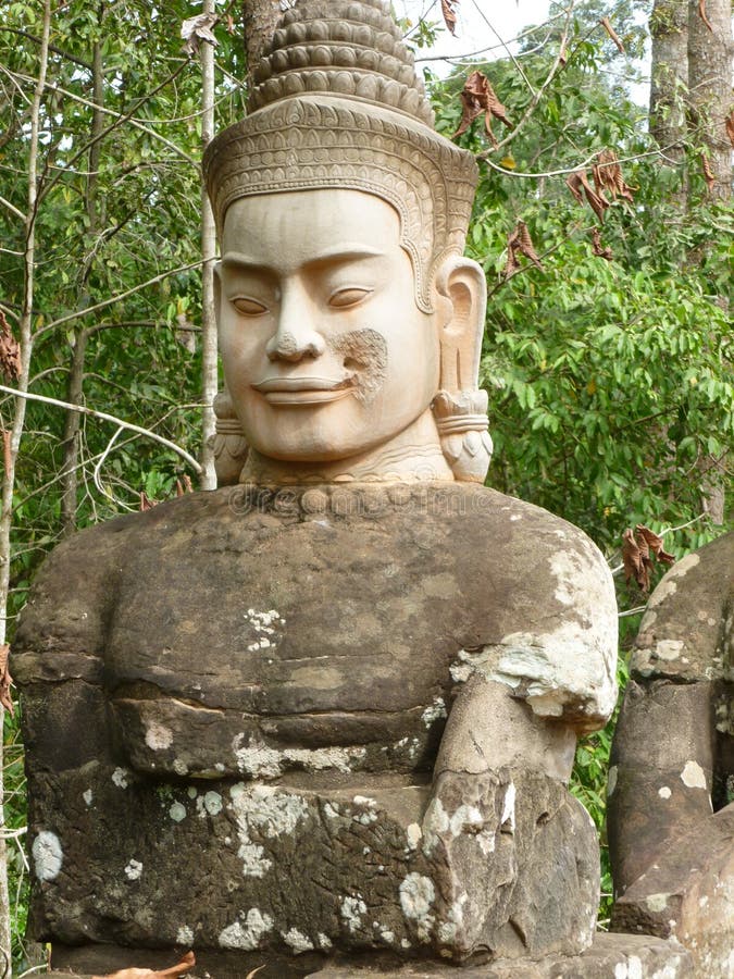A Guardian God at the North Gate To Angkor Thom Stock Image - Image of ...
