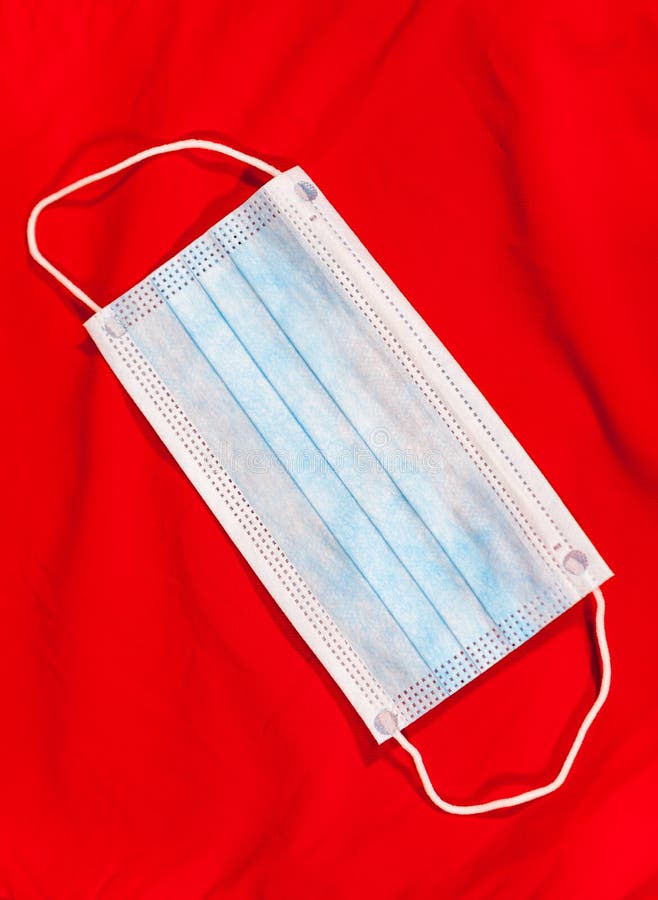 One Disposable Mask Lying on a Red Fabric Stock Image - Image of ...