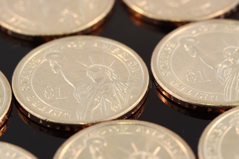 One dollar gold coins stock photo. Image of inscription - 23316822