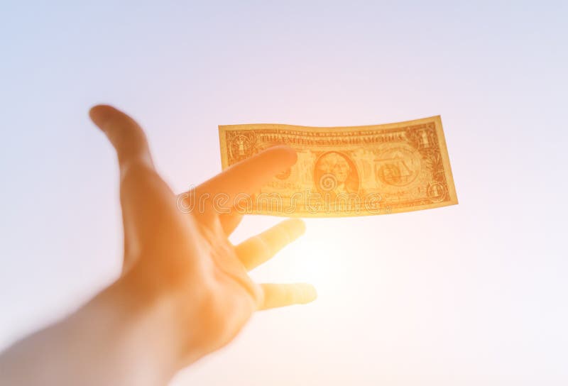 One dollar in hand. stock image. Image of bill, currency - 105444849