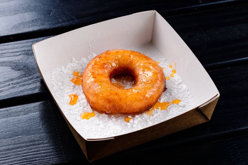 One Doughnut in a Street Food Box Stock Photo - Image of cardboard ...