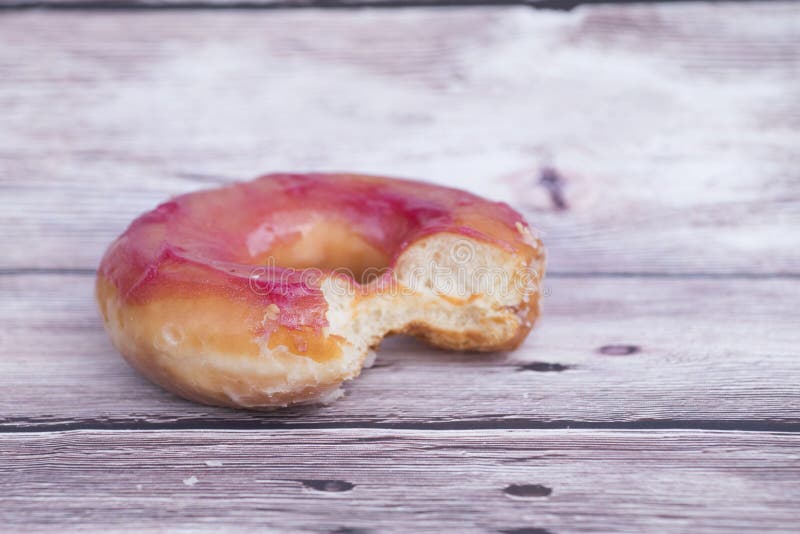 One doughnut on the table stock image. Image of delicacy - 86462139