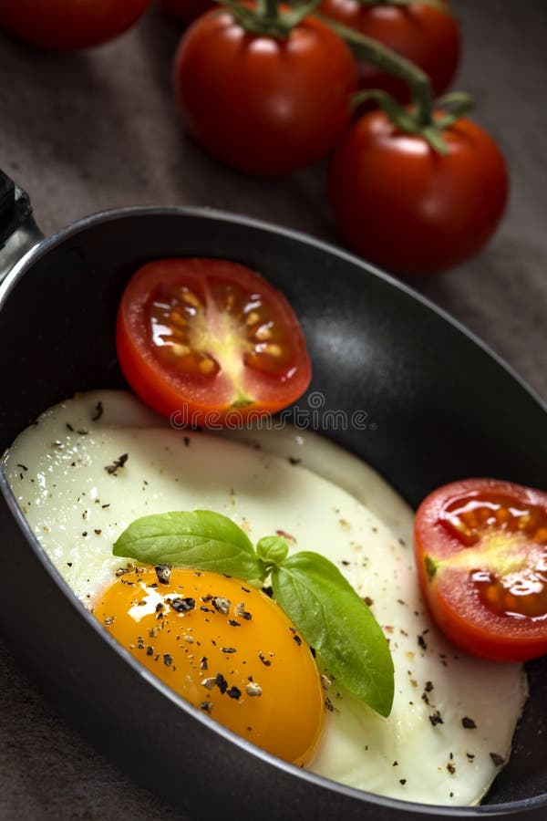 One Egg in a Little Pan with Cherry Tomatoes Stock Image - Image of ...