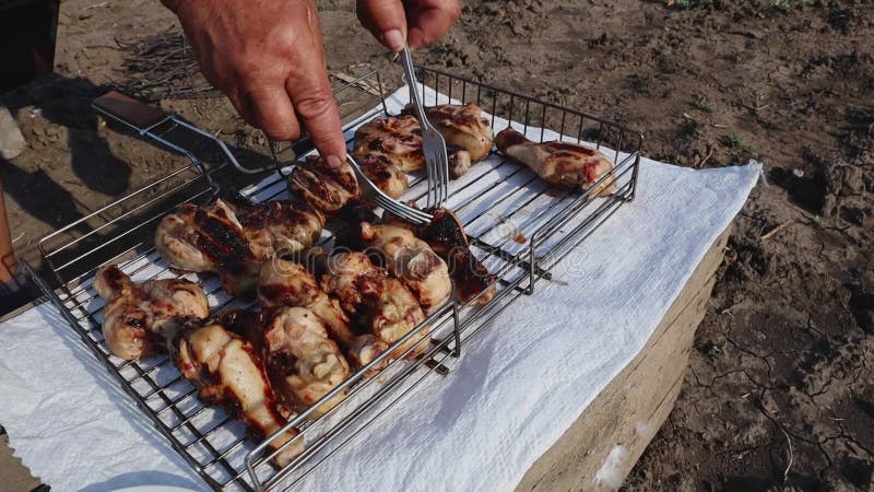 One Old Man is Preparing Grilled Meat in the Garden. Stock Video ...