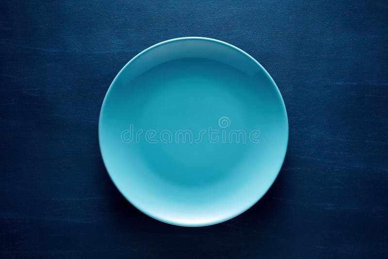 One Empty Blue Round Plate or Dish on Blue Background Stock Photo ...