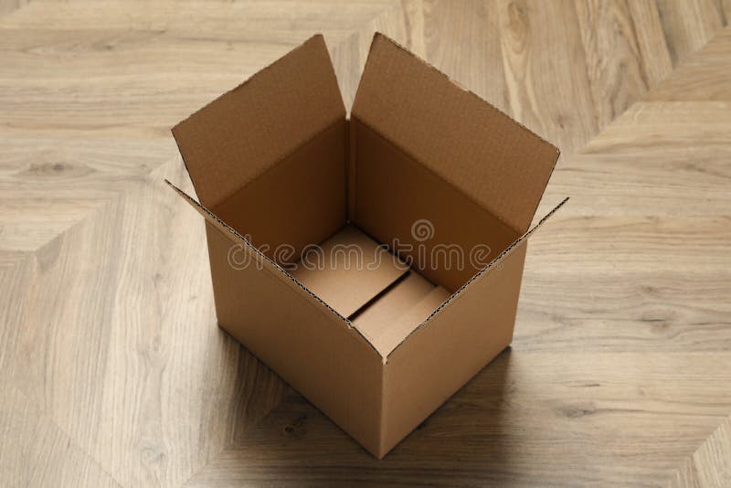 One Empty Cardboard Box on Floor Stock Image - Image of packaging, send ...