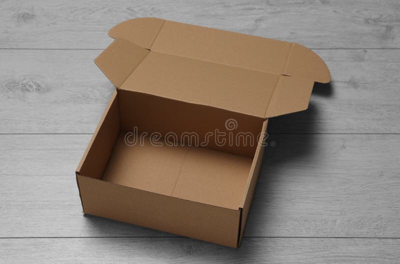 One Empty Open Cardboard Box on Floor Stock Photo - Image of cardboard ...