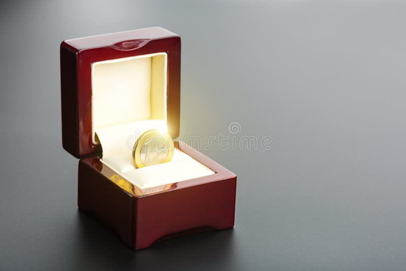 One euro coin in the box stock photo. Image of coin, monetary - 48535524