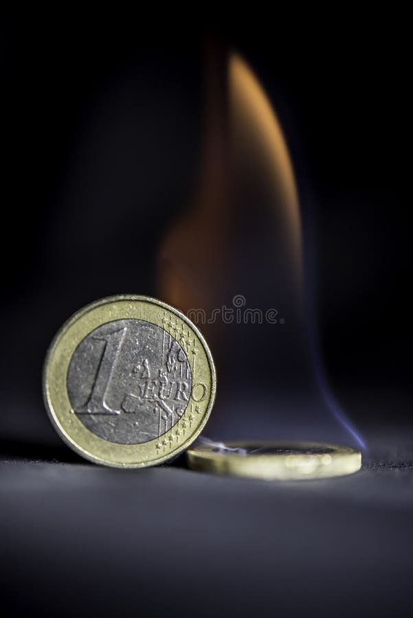 One euro coins on fire stock image. Image of european - 86250339