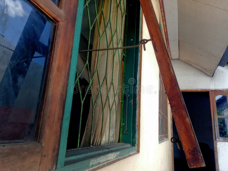 One Example of a House Window with Iron Grilles Stock Image - Image of ...