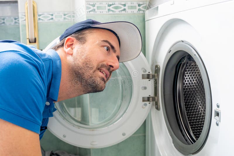 One Repairman Fixing Malfunctioning Kitchen Oven Problem Stock Image ...