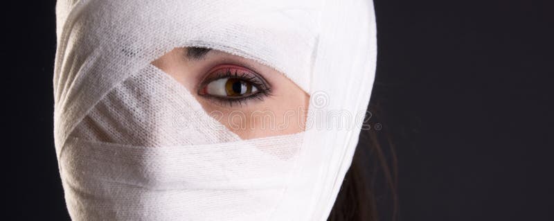 One Eye Showing through Head Injury Bandage Stock Photo - Image of ...