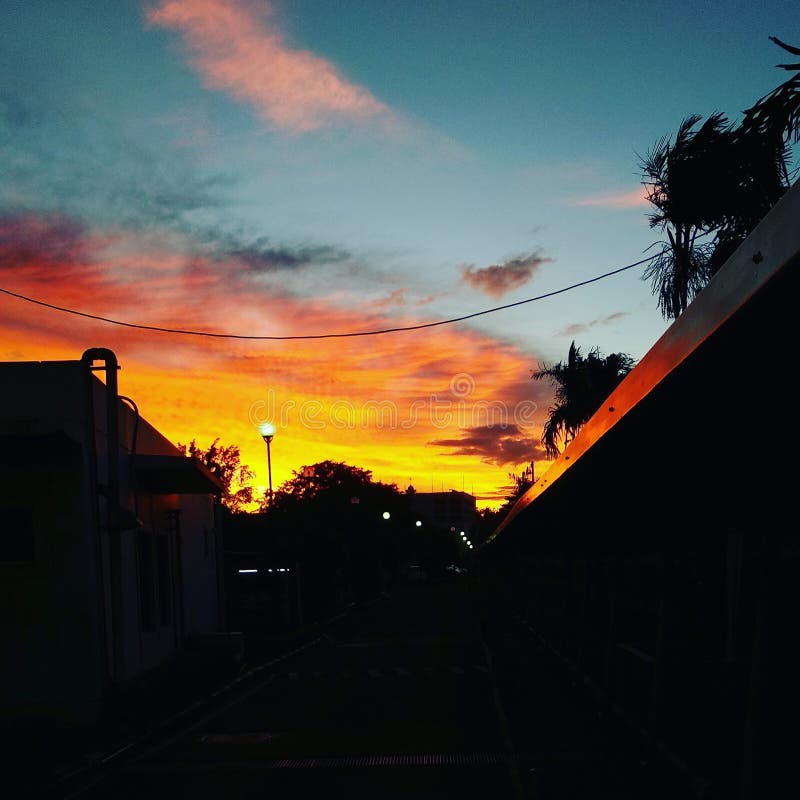 One fine sunset in Jakarta stock image. Image of reflection - 251655335