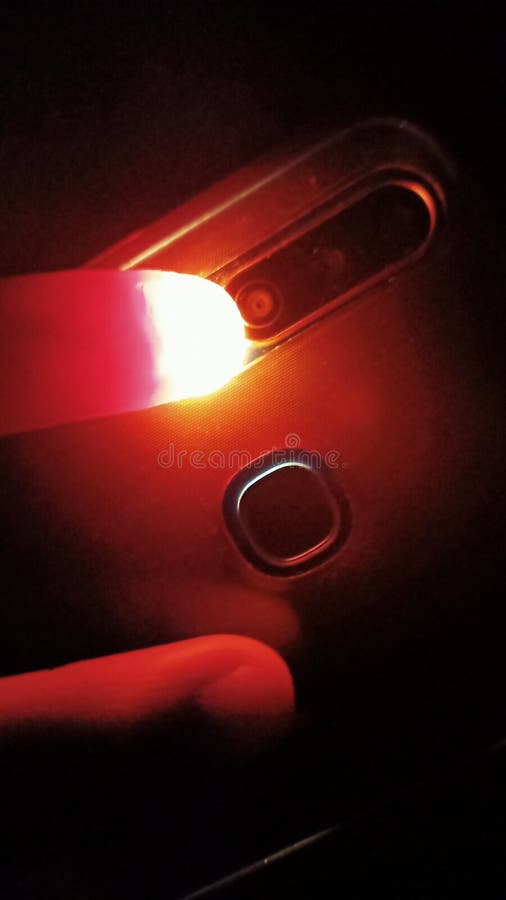 One Finger Over a Phone S Torch Stock Image - Image of darkness ...