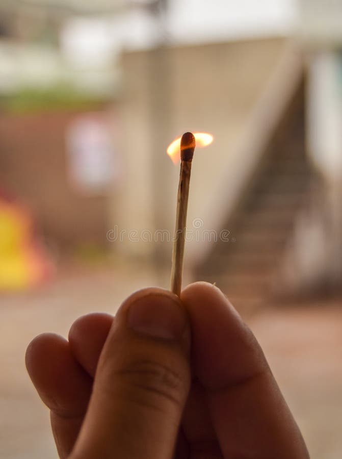 One Flame Stick in Hand stock photo. Image of stick - 154337630