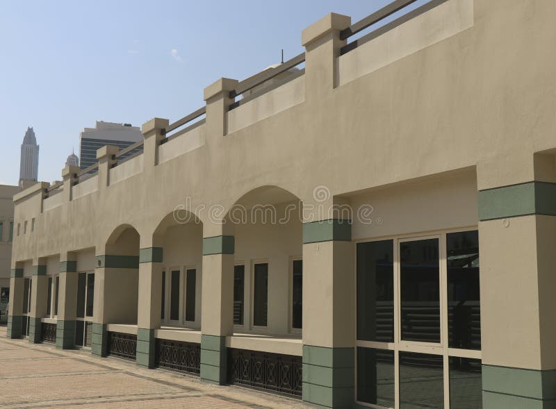 One Floor White Building with Skyscrapers Behind Stock Image - Image of ...