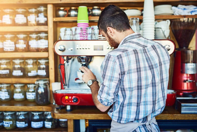 One Freshly Brewed Coffee Coming Up. a Barista Making Coffee. Stock ...