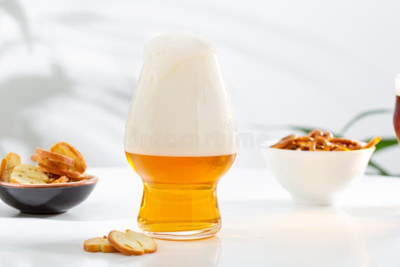 One Glass with Light Craft Beer Food and Drink on Light Surface Stock ...