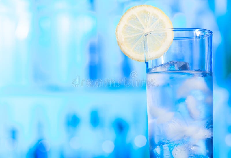 One Glass of Water with Ice Cubes and Lemon Slice Stock Photo - Image ...