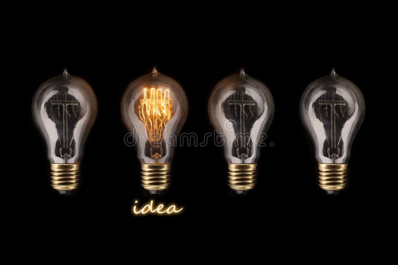 One Glowing Light Bulb Amongst Other Light Bulbs Stock Image - Image of ...
