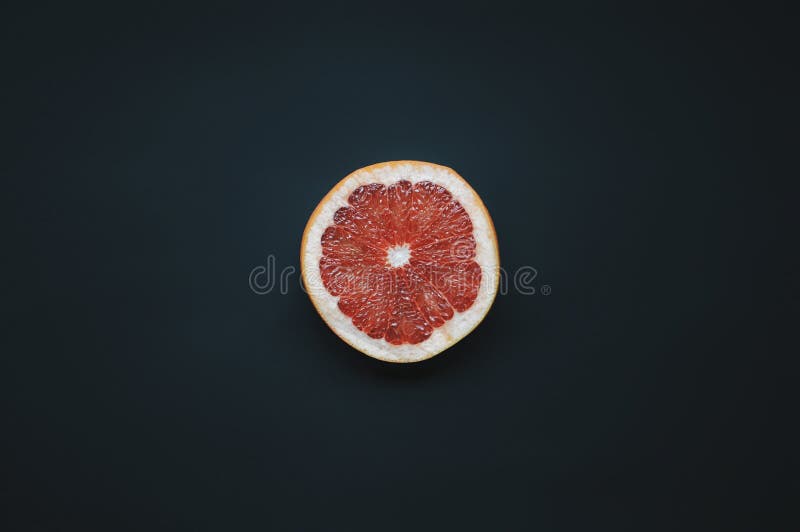 One Grapefruit on Dark Background. Stock Photo - Image of round ...