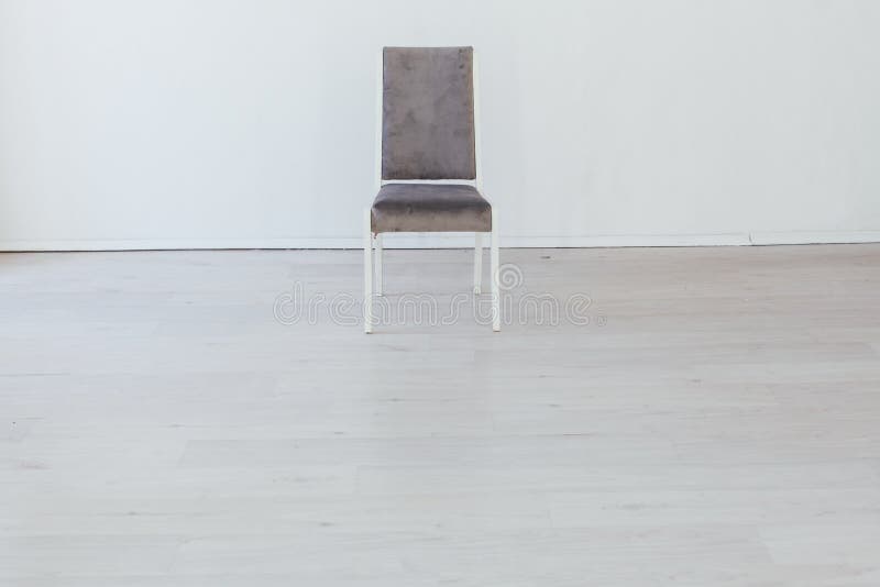 One Gray Chair in the Interior of an Empty White Room Stock Photo ...
