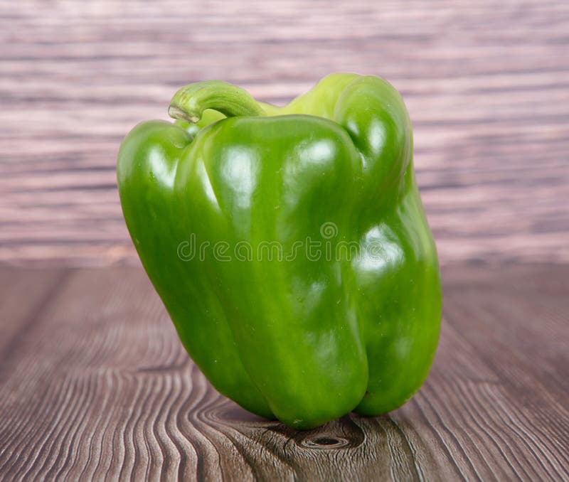 One Green Bell Pepper on Table Stock Photo - Image of chili, table ...
