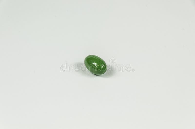 One Green Soft Gelatine Capsule. Stock Image - Image of drugstore ...