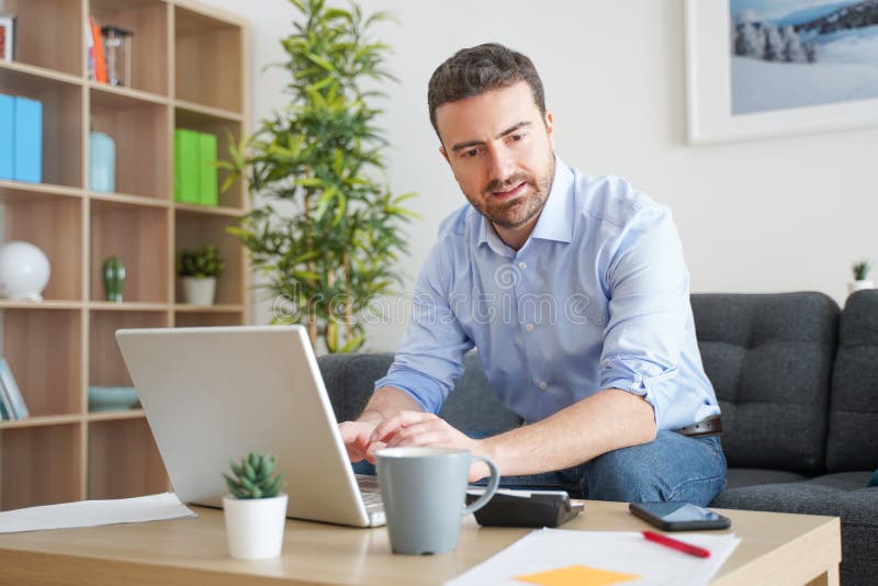 One Guy Working from Home Using Internet Connection Stock Image - Image ...