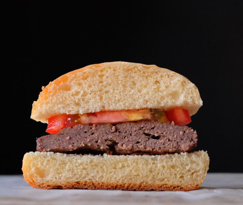 One Half of a Beef Burger (Front View) Stock Photo - Image of cuisine ...
