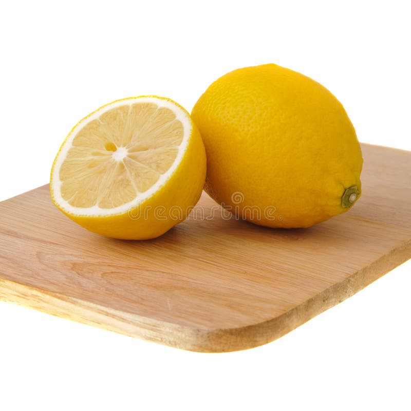 One and a Half of Lemon on Chopping Board Stock Image - Image of ...