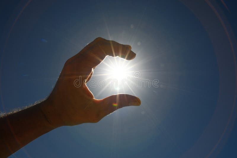 One Hand Catching the Sun Stars on Stock Image - Image of blue ...