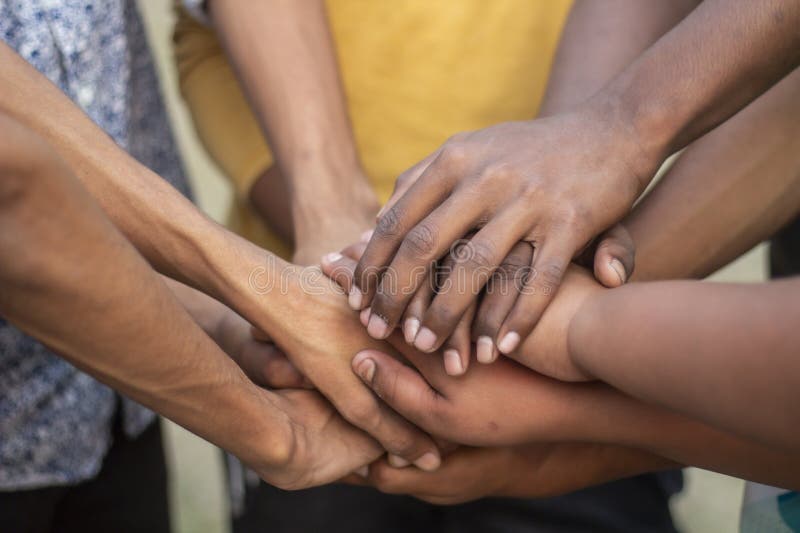One Hand Down and the Other Hands on Top of that Hand Stock Image ...