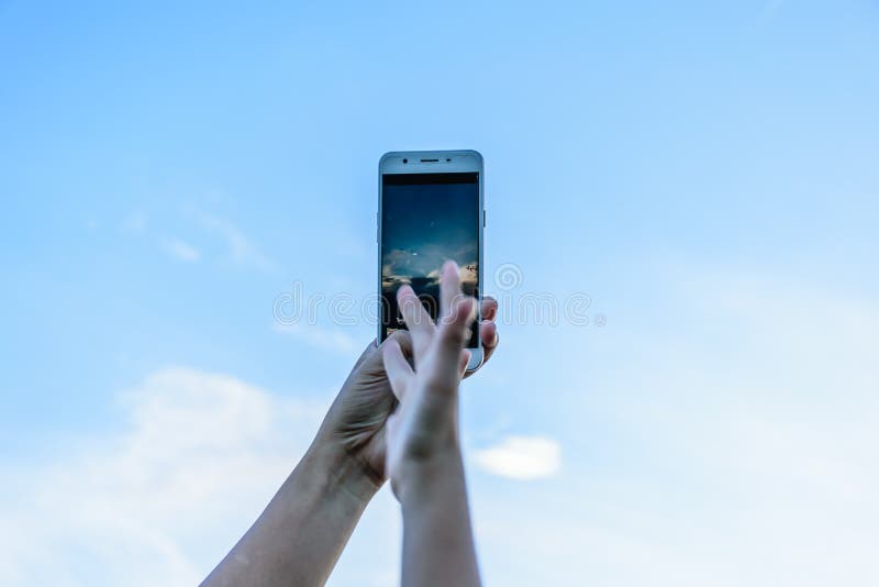 Smart phone shooting stock image. Image of holiday, sunset - 102156163